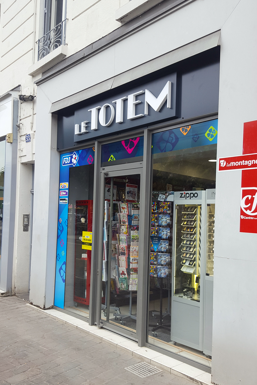 Enseigne Le Totem - c-toucom, l'agence